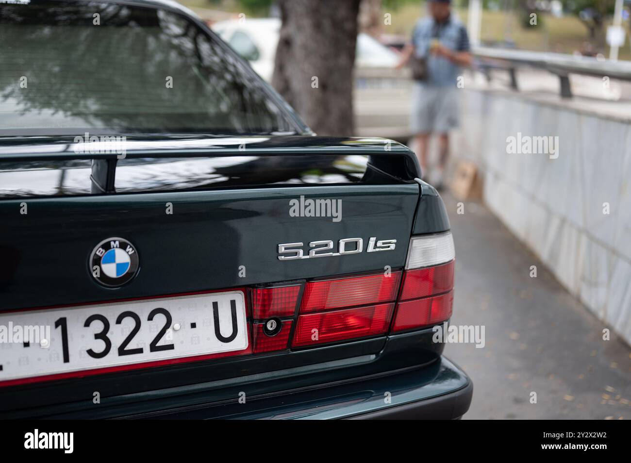 Detail of the rear of a classic BMW 5 series E34 with the letters that ...