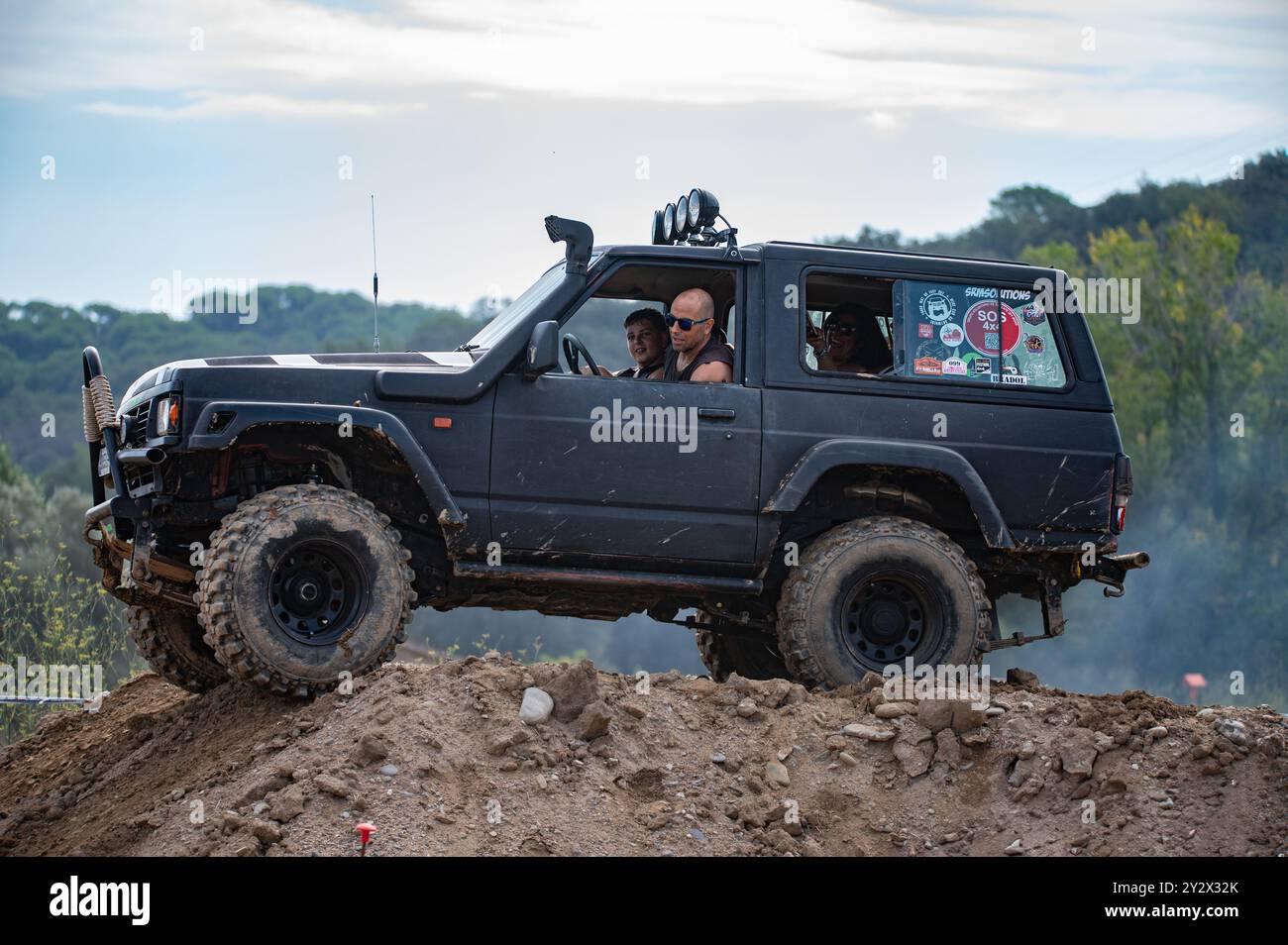 the 1989 third-generation Nissan Patrol 260 Series in black, it is ...