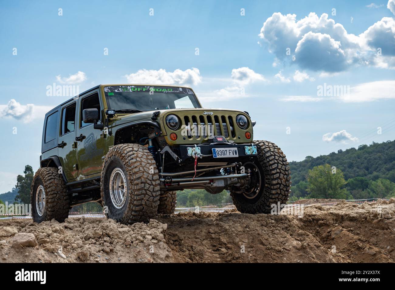 American 4x4 highly modified for extreme off-roading, it is a yellow ...