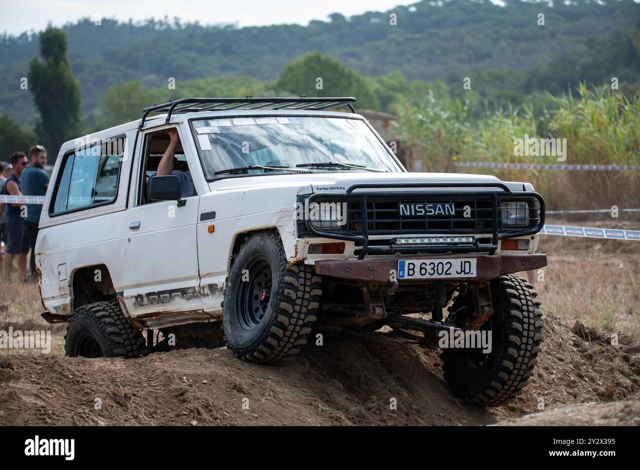 Front view of a classic white third-generation Nissan Patrol series 160 ...