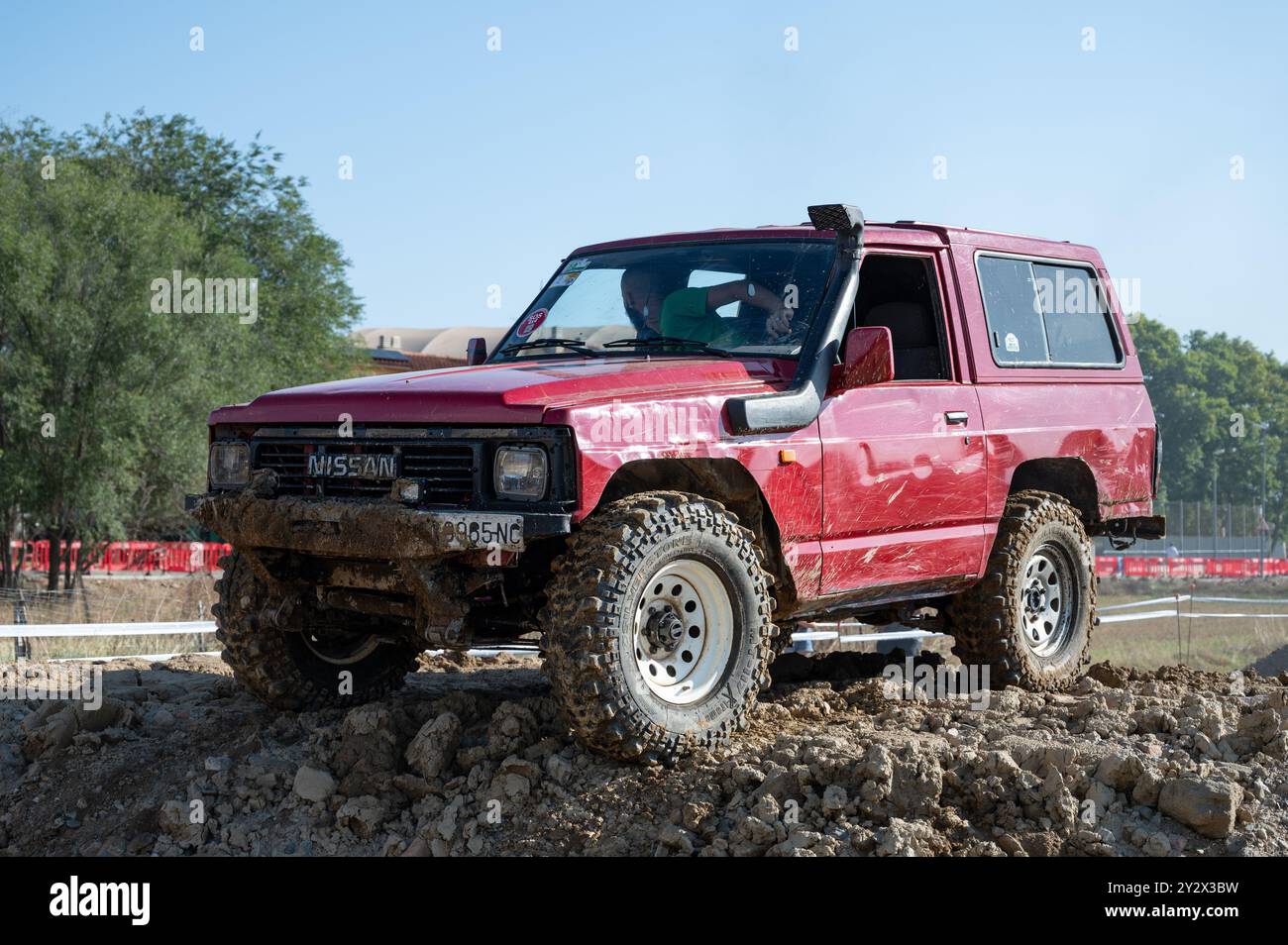Detail of a classic red Nissan Patrol 260 Series third generation off ...