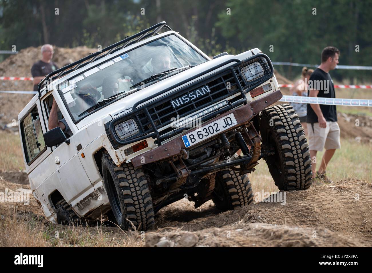 Front view of a classic white third-generation Nissan Patrol series 160 ...