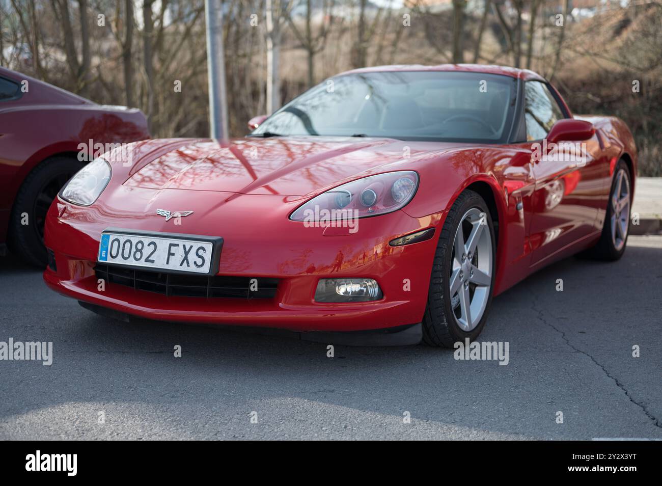 Front view of a classic red sixth generation Chevrolet Corvette C6 ...
