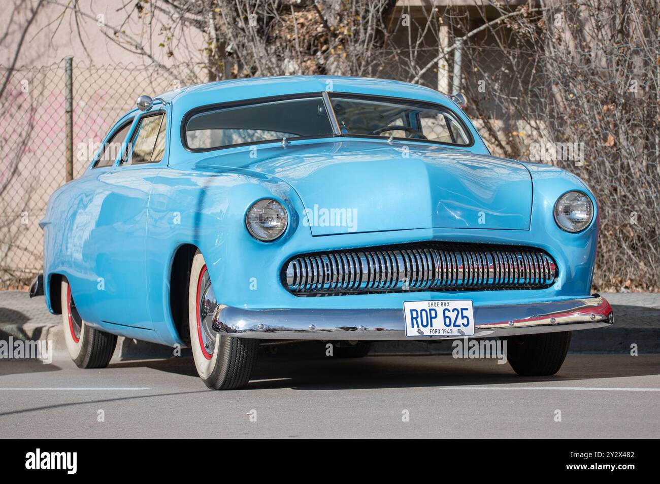 Front view of a blue and chrome Hot Rod based on a 1949 Ford Stock ...