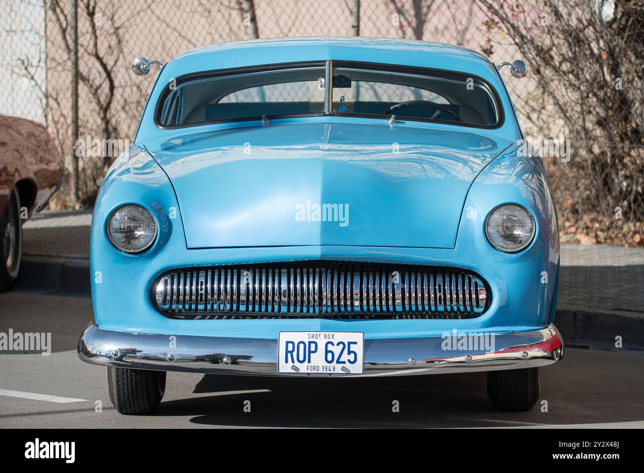 Front view of a blue and chrome Hot Rod based on a 1949 Ford Stock ...