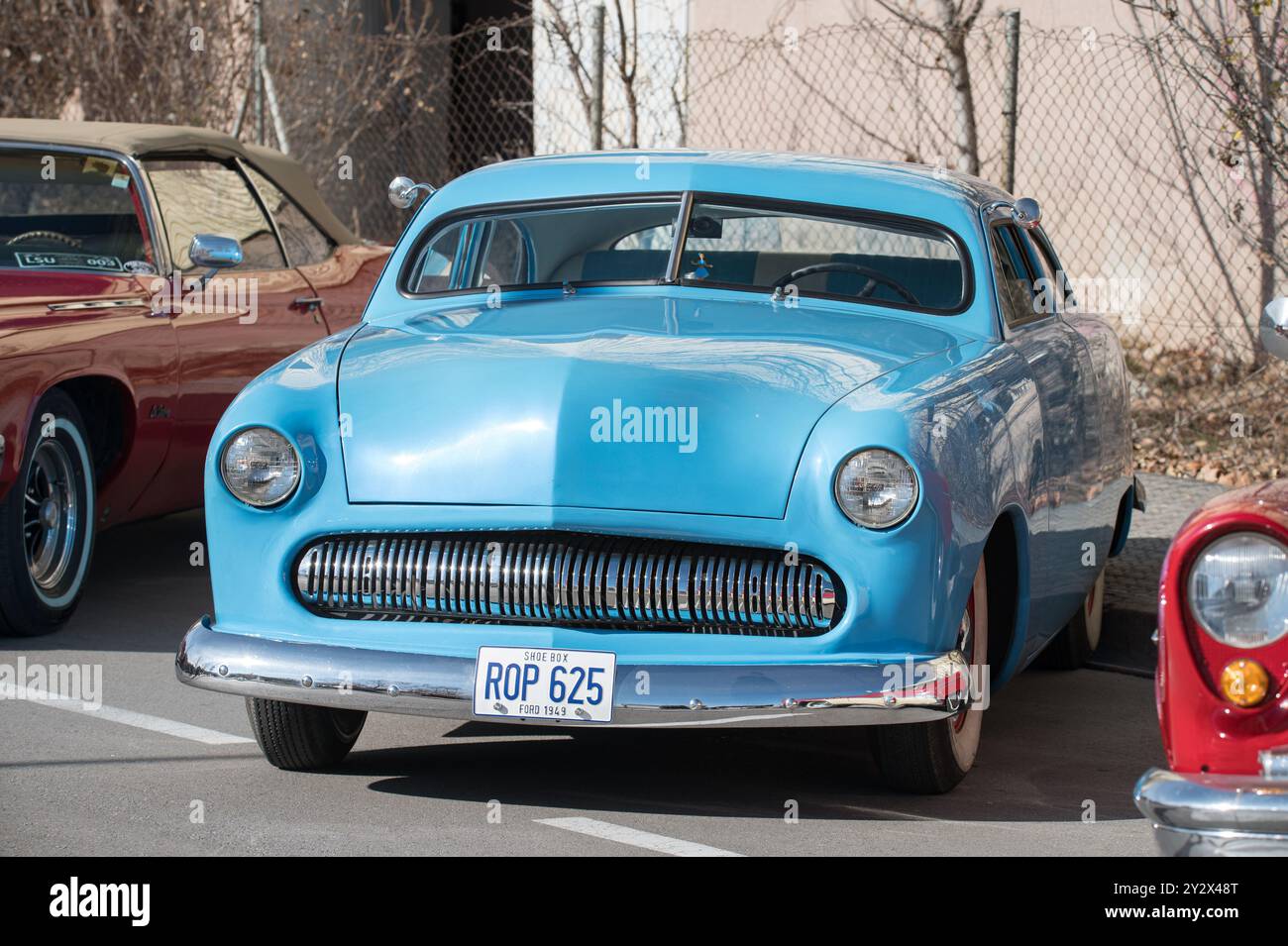 Front view of a blue and chrome Hot Rod based on a 1949 Ford Stock ...