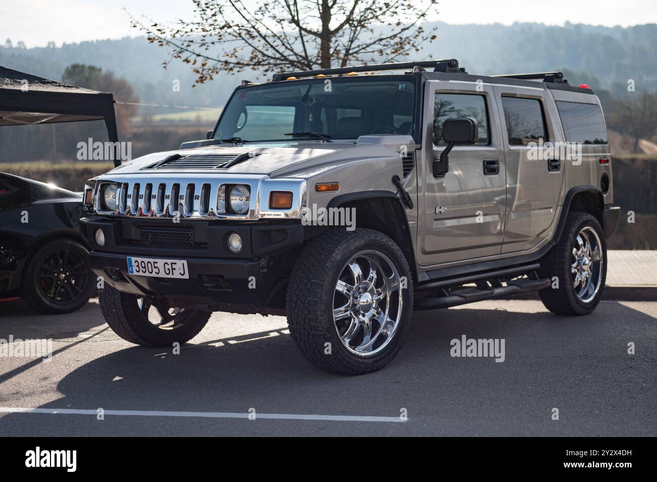 Front view of a spectacular brown American Hummer H2 off-road vehicle ...