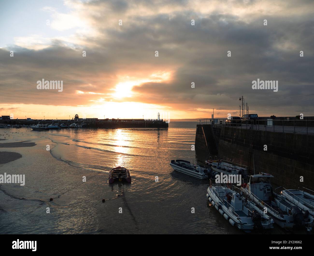 Sunset, St Ives Lighthouse, and Harbour Wall, St Ives Harbour, St Ives ...