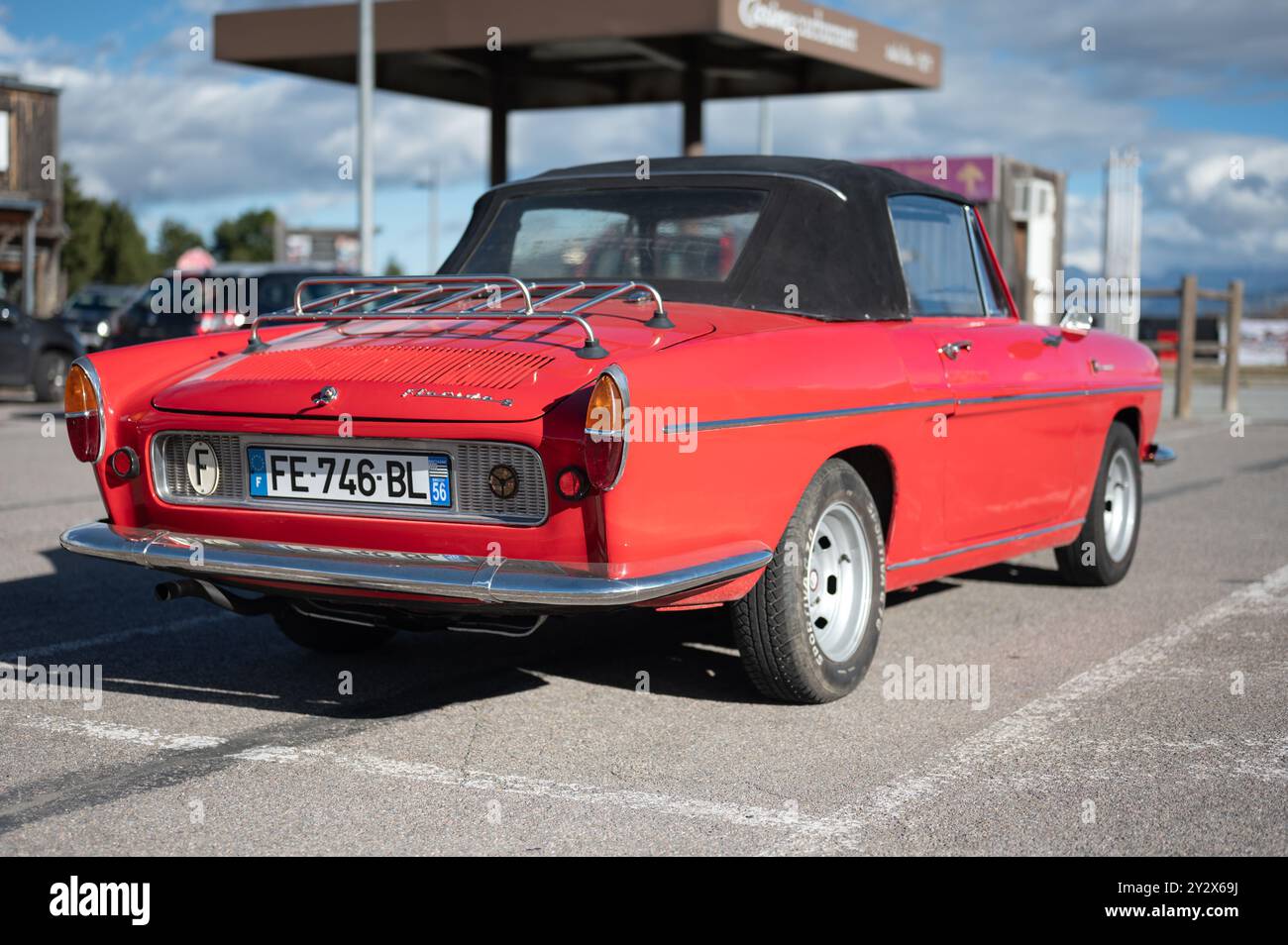 Rear view of a red classic French convertible sports car, the Renault ...