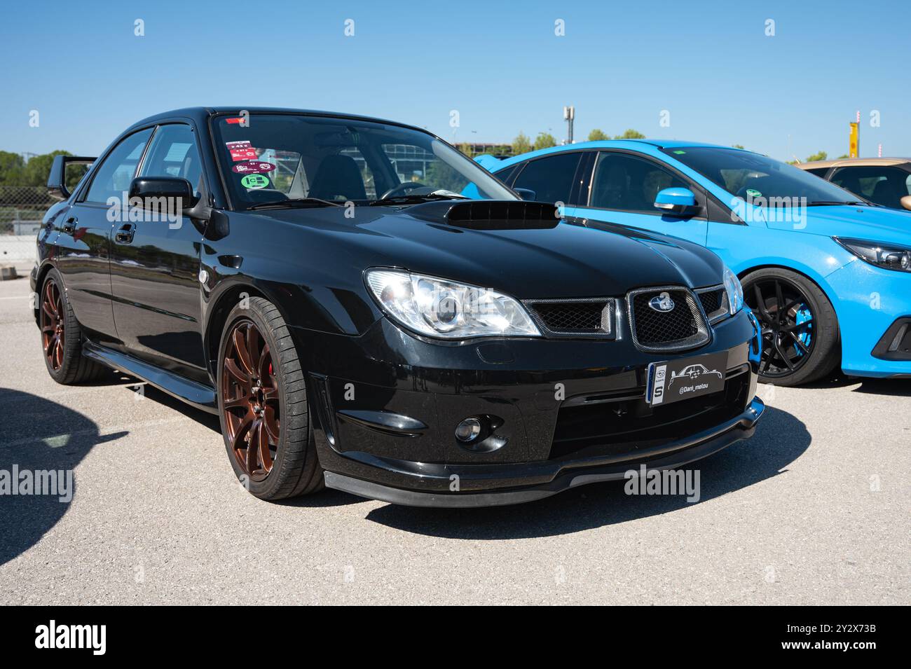 Front view of a black second generation Subaru Impreza Japanese sports ...