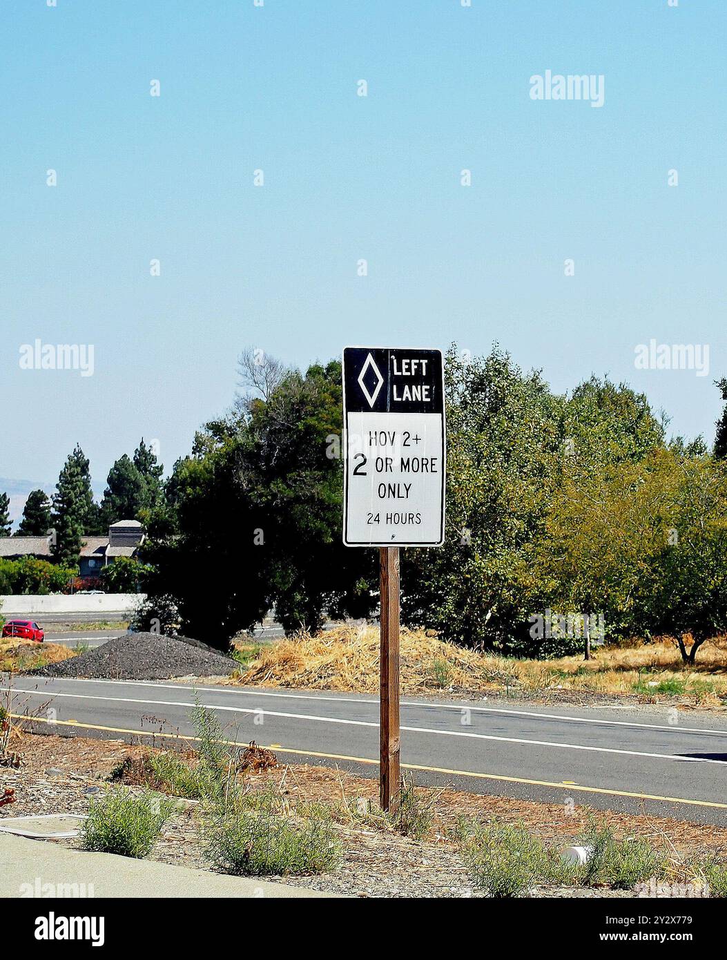 Left Lane, HOV 2+, 2 or more only, 24 hours, traffic sign at freeway ...