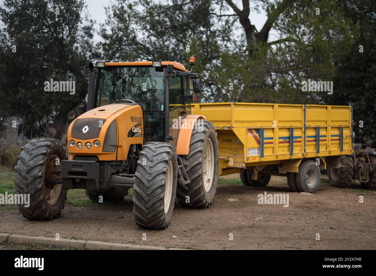 Front view of a large modern yellow Renault Celtis 456 RX tractor with ...