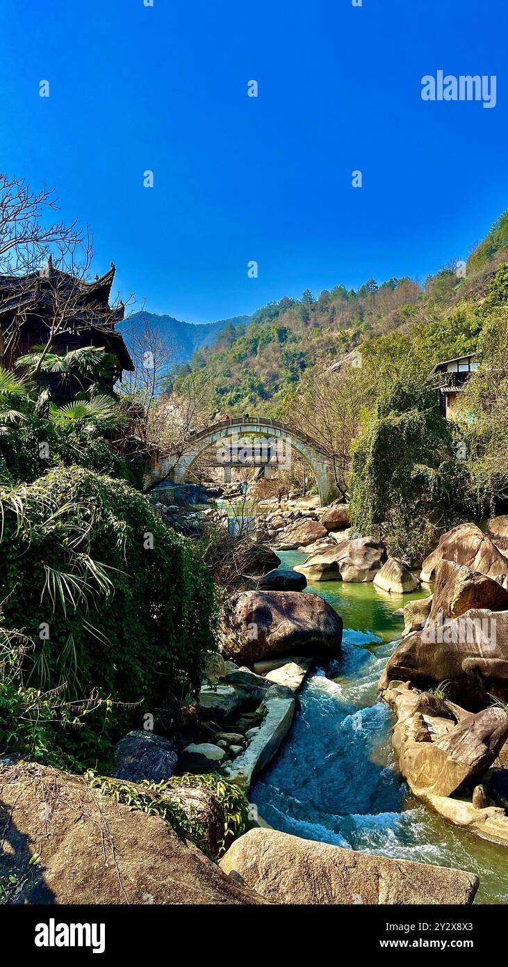 Scenic view of a traditional Chinese stone bridge over a river ...
