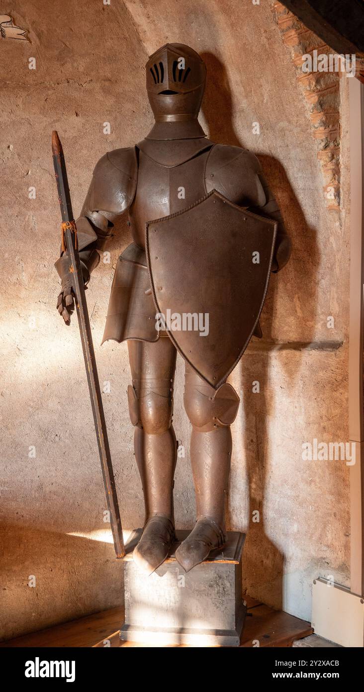 A medieval knight's armor displayed in a historical setting, showcasing ...