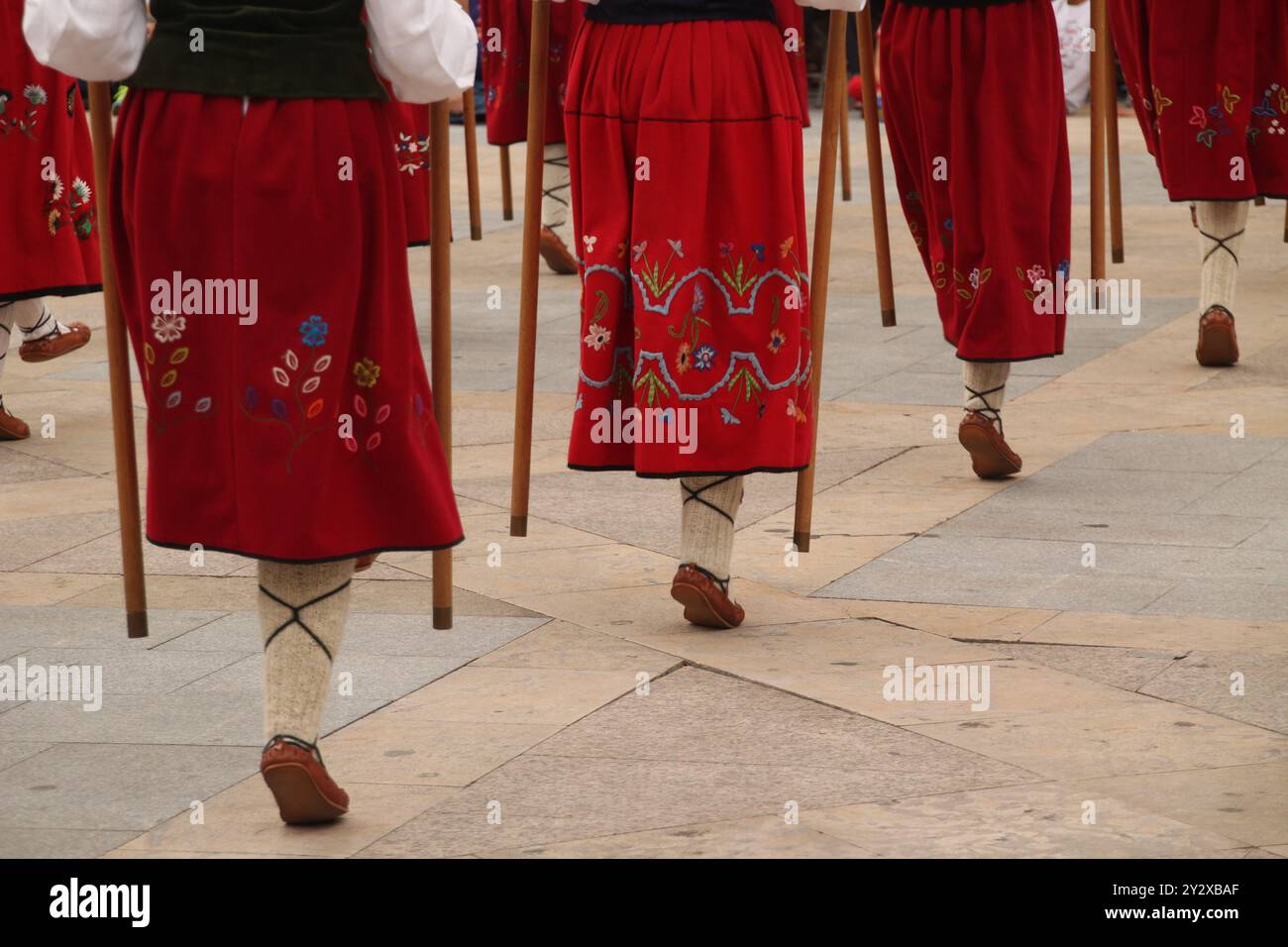 The dancers performing Basque folk dance in an outdoor festival in the ...