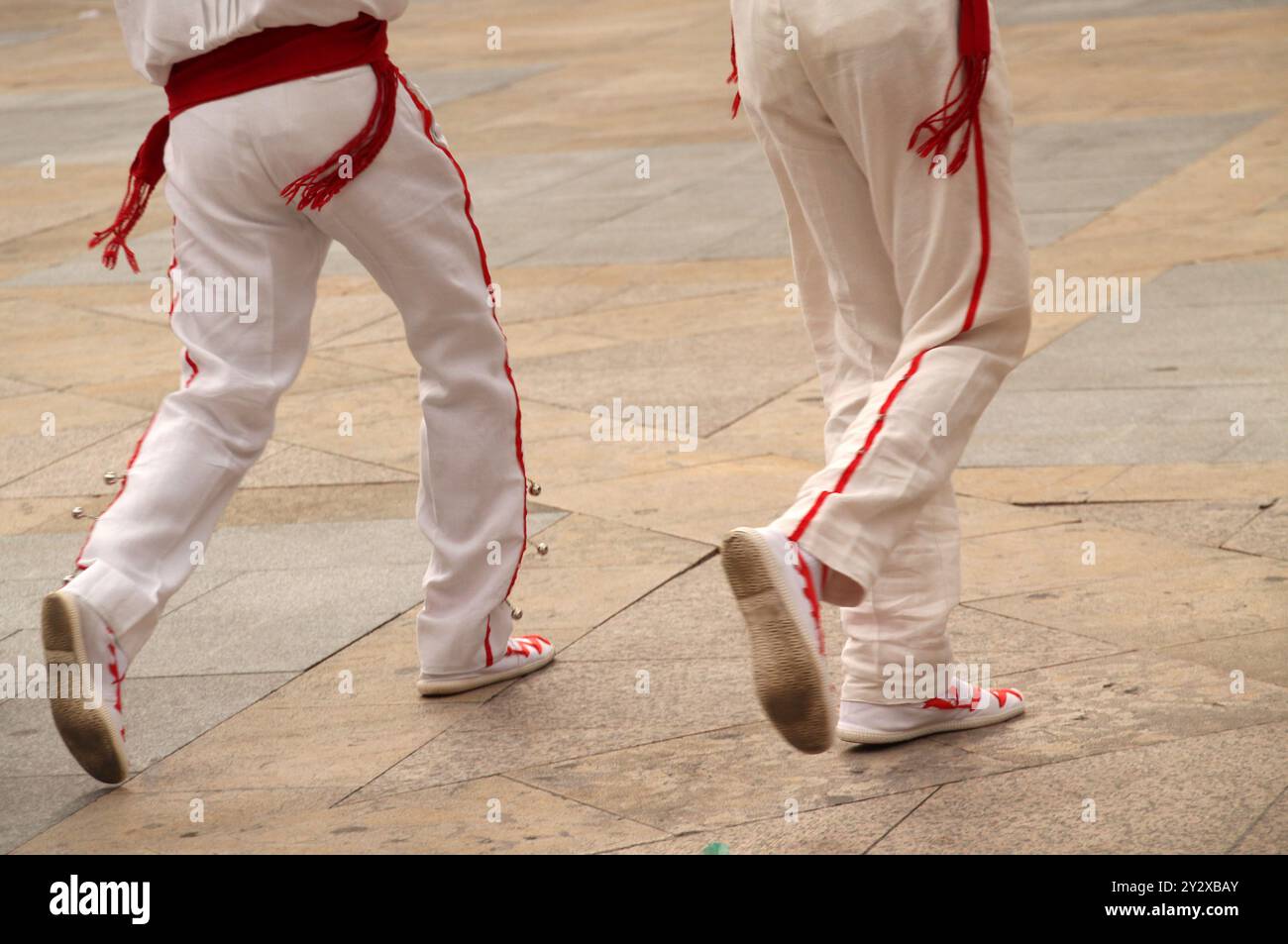 The dancers performing Basque folk dance in an outdoor festival in the ...