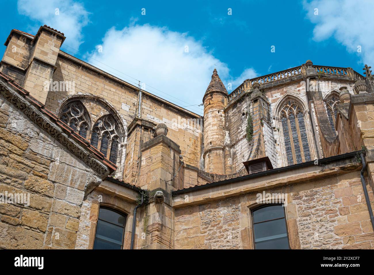 A detailed view of an old stone church with Gothic architecture ...