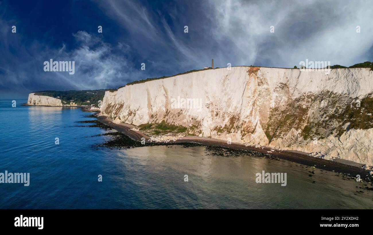 A stunning view of the White Cliffs of Dover with a dramatic sky and ...