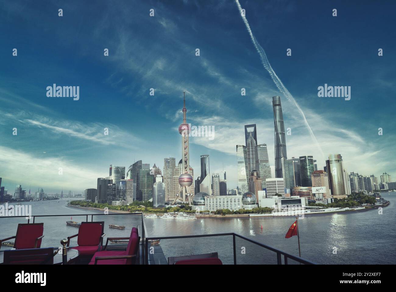 A stunning view of Shanghai's modern skyline from a rooftop terrace ...