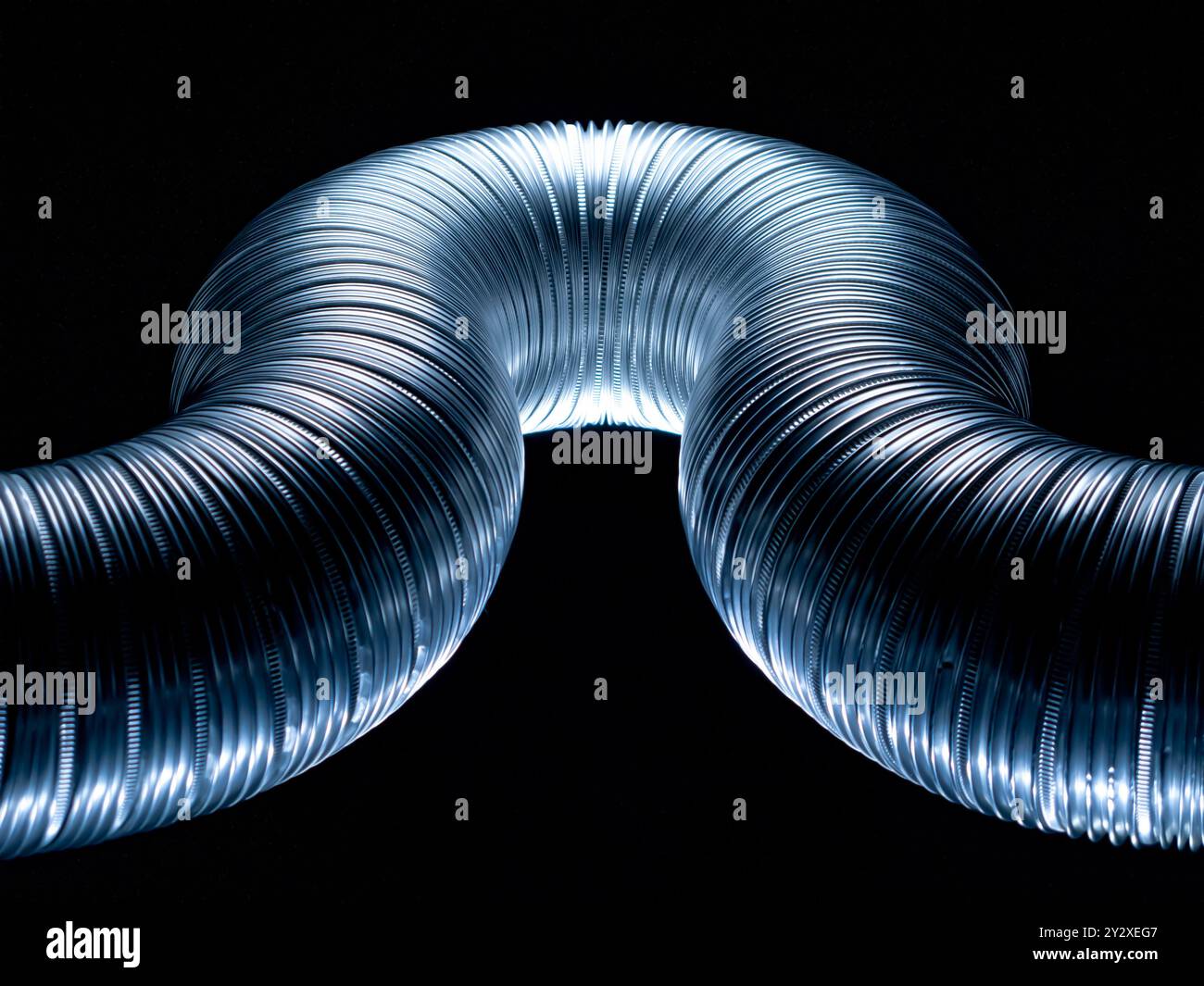 The wave textured metal pipe Stock Photo - Alamy