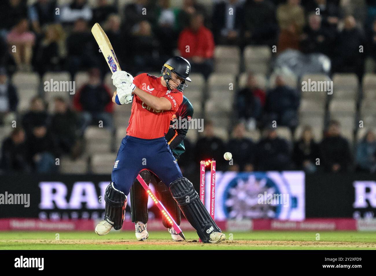 Jacob Bethell of England is bowled out by Adam Zappa of Australia ...
