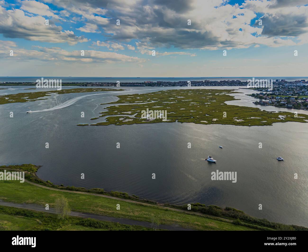 A high angle aerial view over Island Park, Long Island, New York on a ...