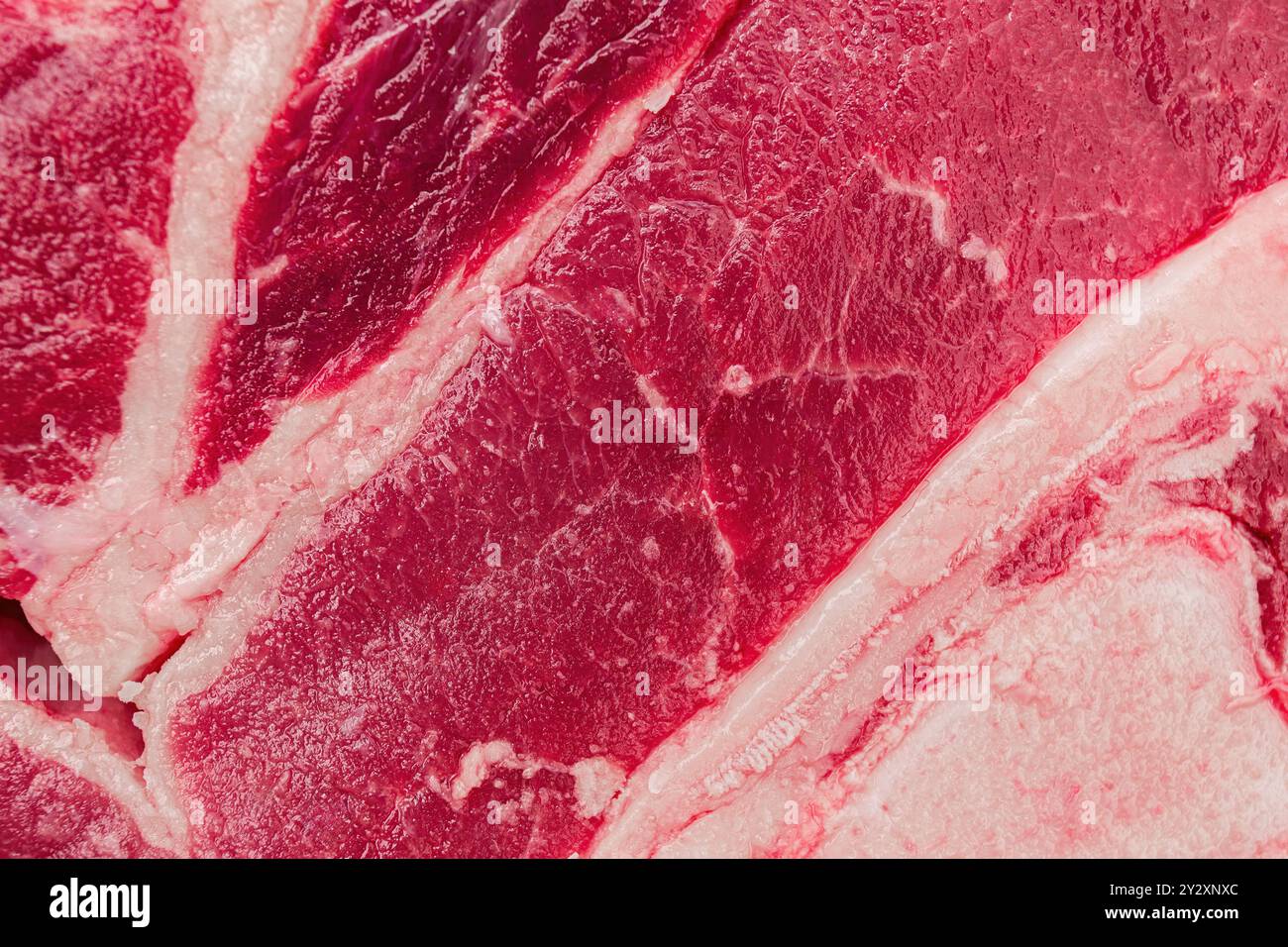 Raw beef steak showcasing its rich texture and marbling Stock Photo - Alamy