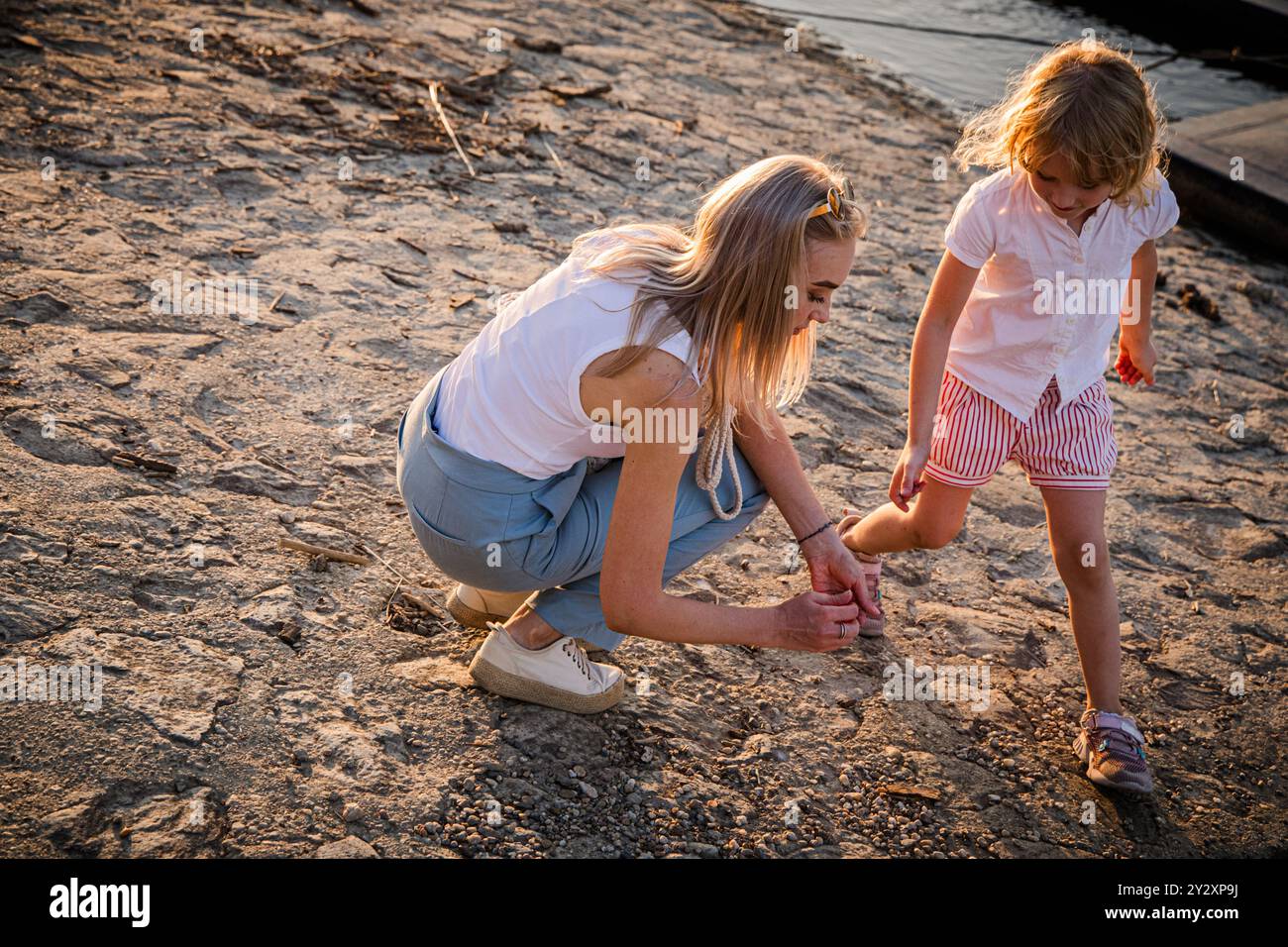 Children play sandy riverbank hi-res stock photography and images - Alamy