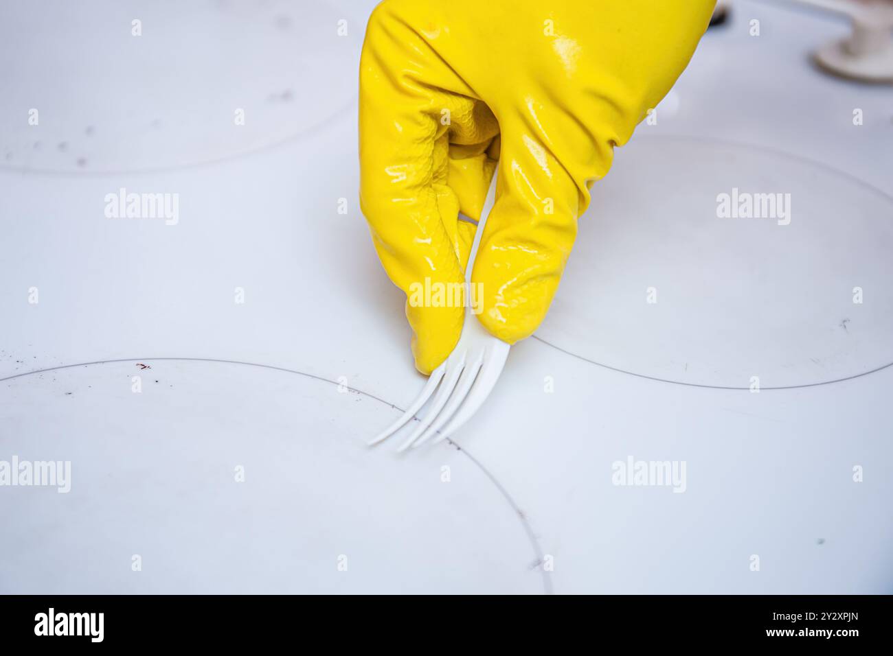Person hand in glove scrape hi-res stock photography and images - Alamy