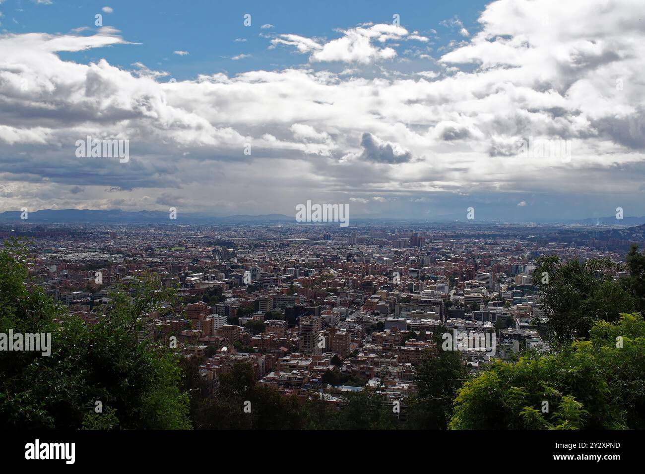 A Panoramic view of a sprawling cityscape of Bogota with a mix of ...