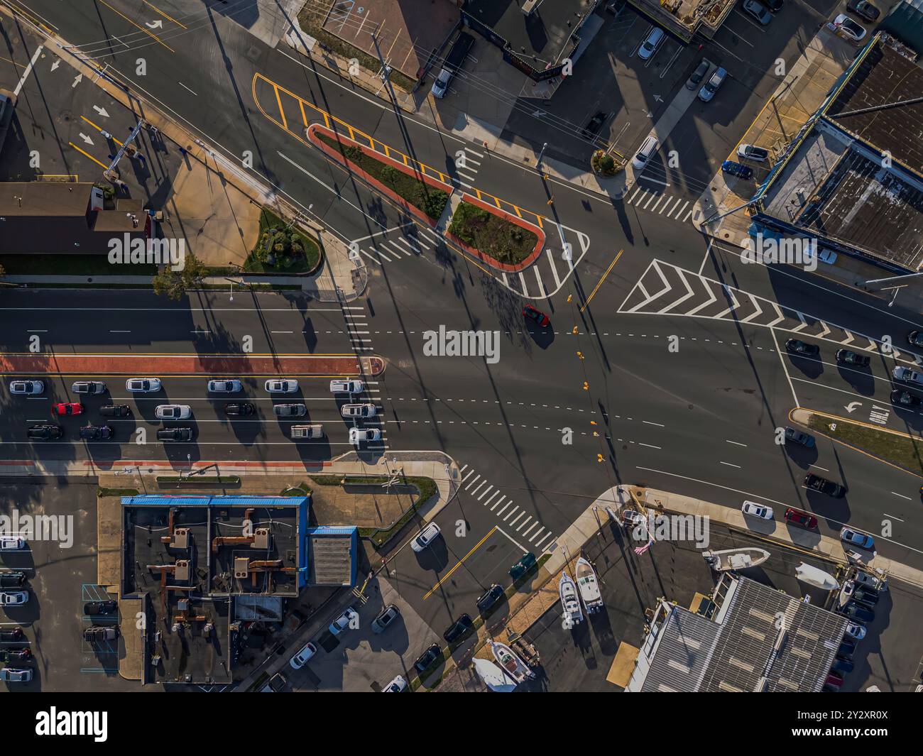 Aerial view of a busy urban intersection with multiple lanes and ...