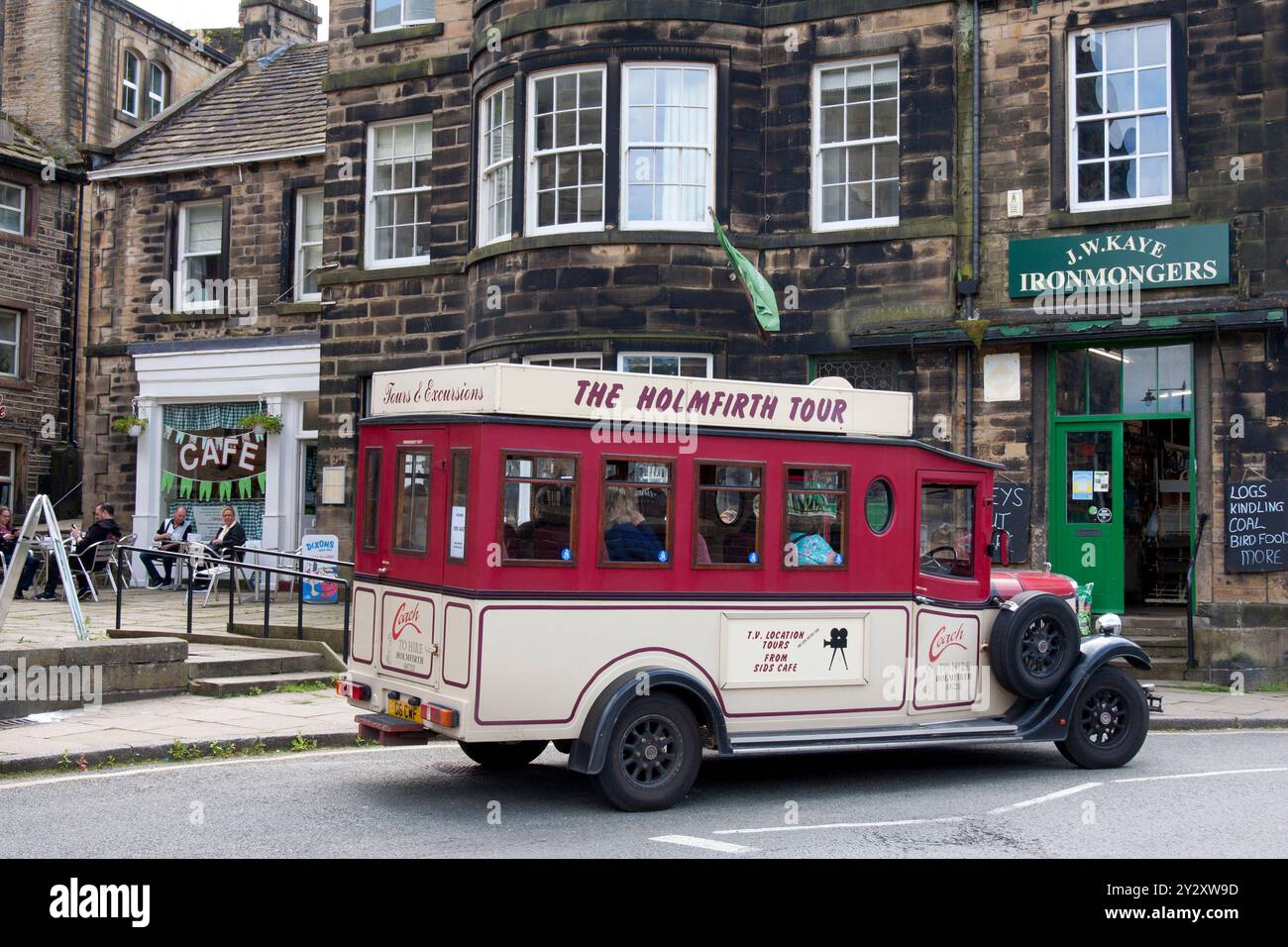vintage tour bus outside Sid's cafe, Holmfirth, which was the filming ...
