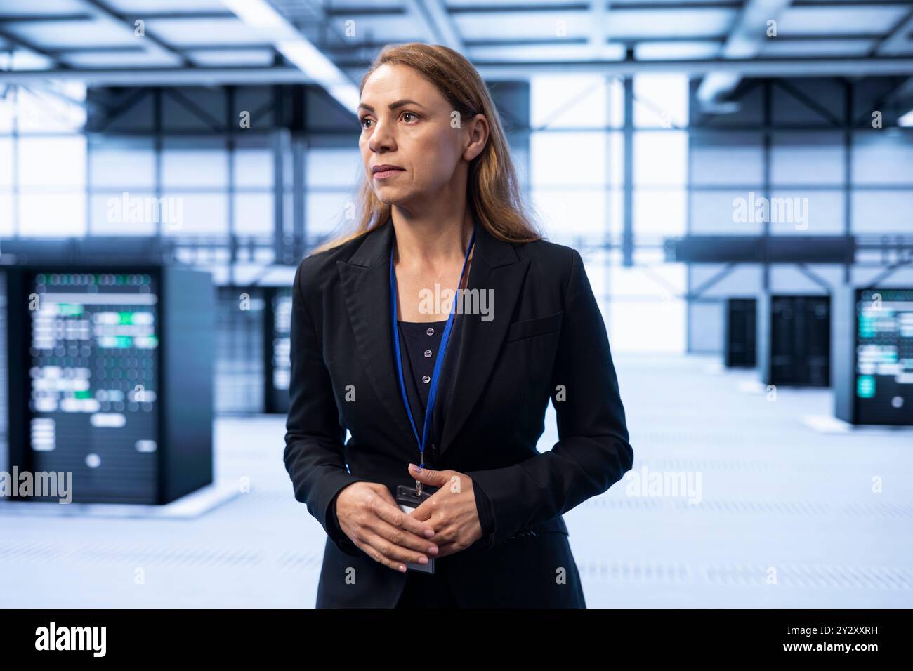 IT expert managing data center with advanced technology, ensuring cybersecurity and efficient ...