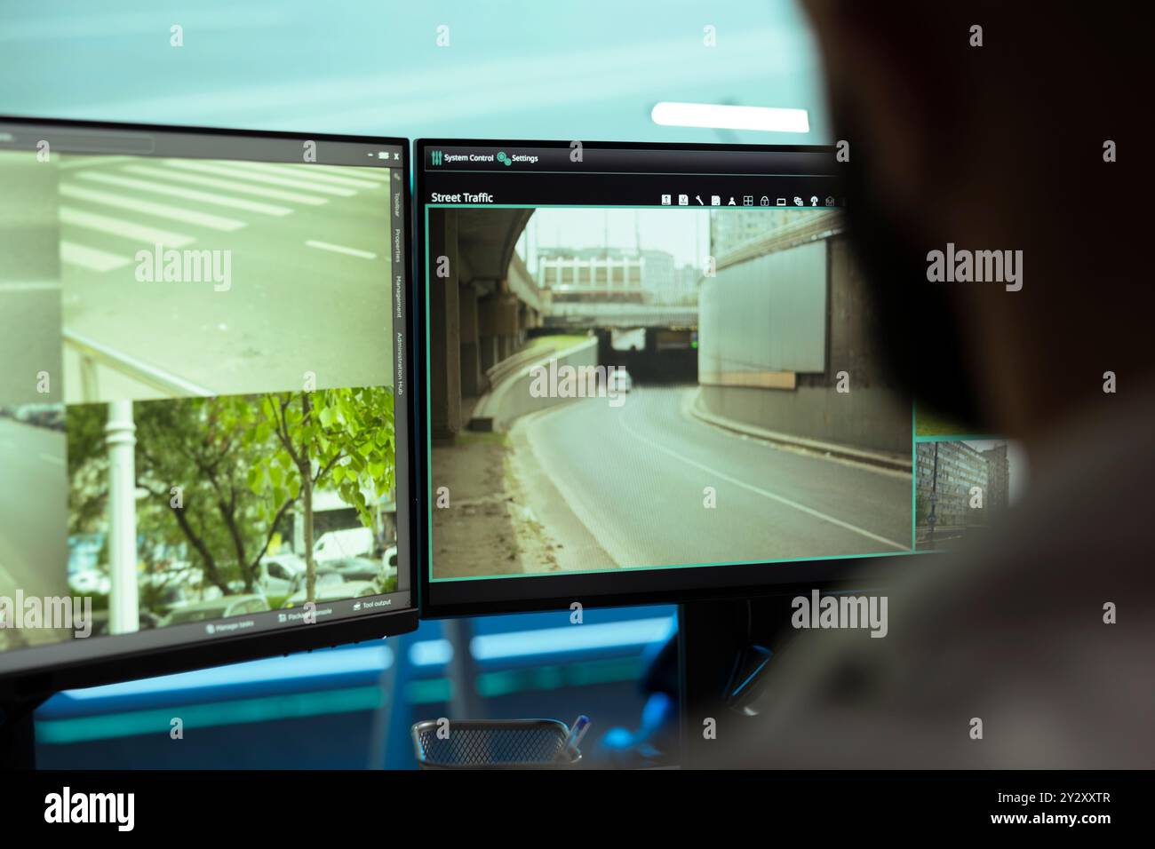 African american employee monitoring traffic activity in observation ...