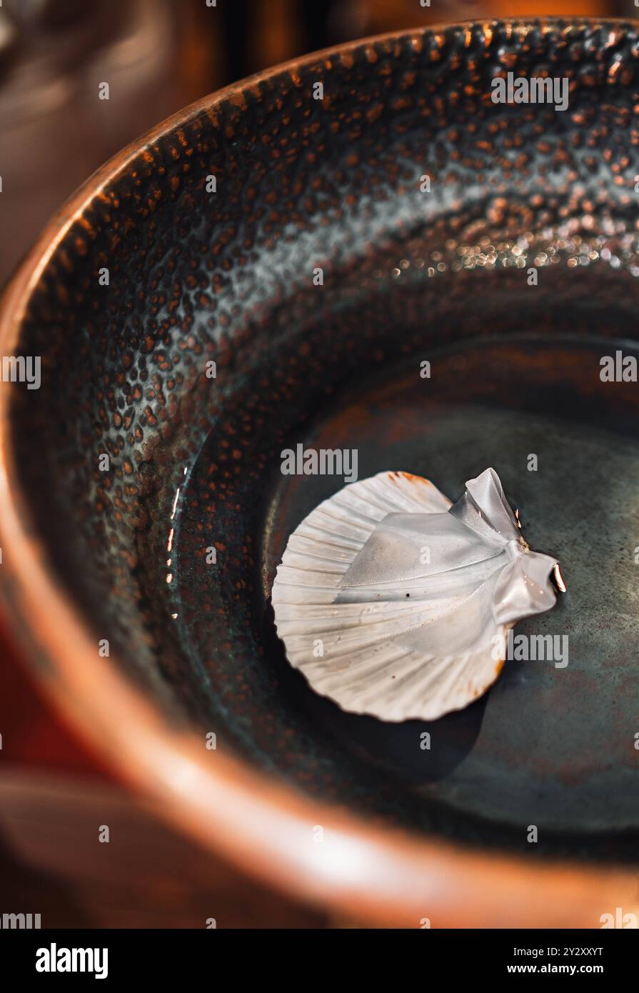 Baptism Shell Symbol and Holy Water Stock Photo - Alamy