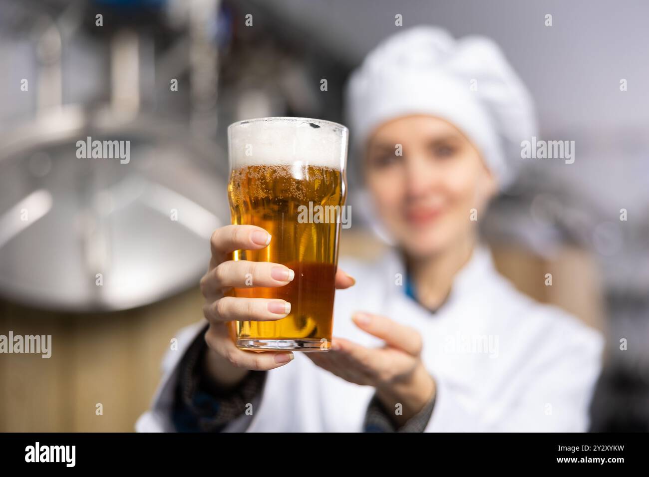 Woman brewer holding glass hi-res stock photography and images - Alamy