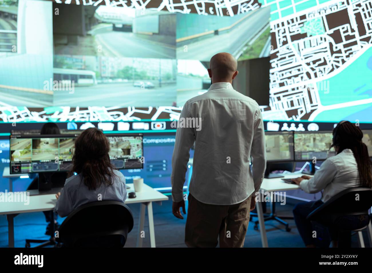 Team leader tracking delivery trucks location around the city ...