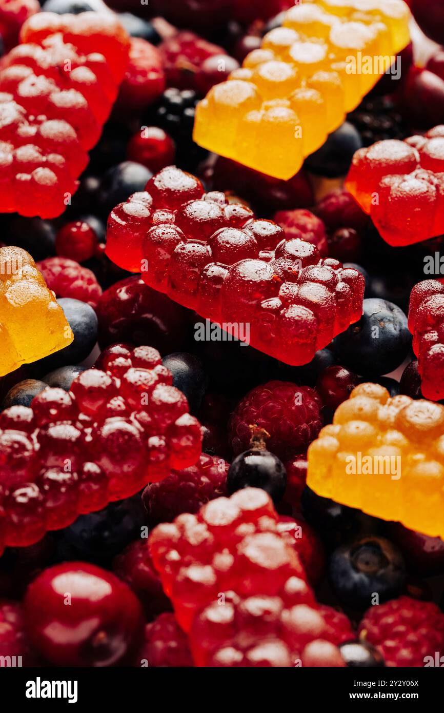 Colorful natural berry marmalade on fresh mixed fruits and berries ...