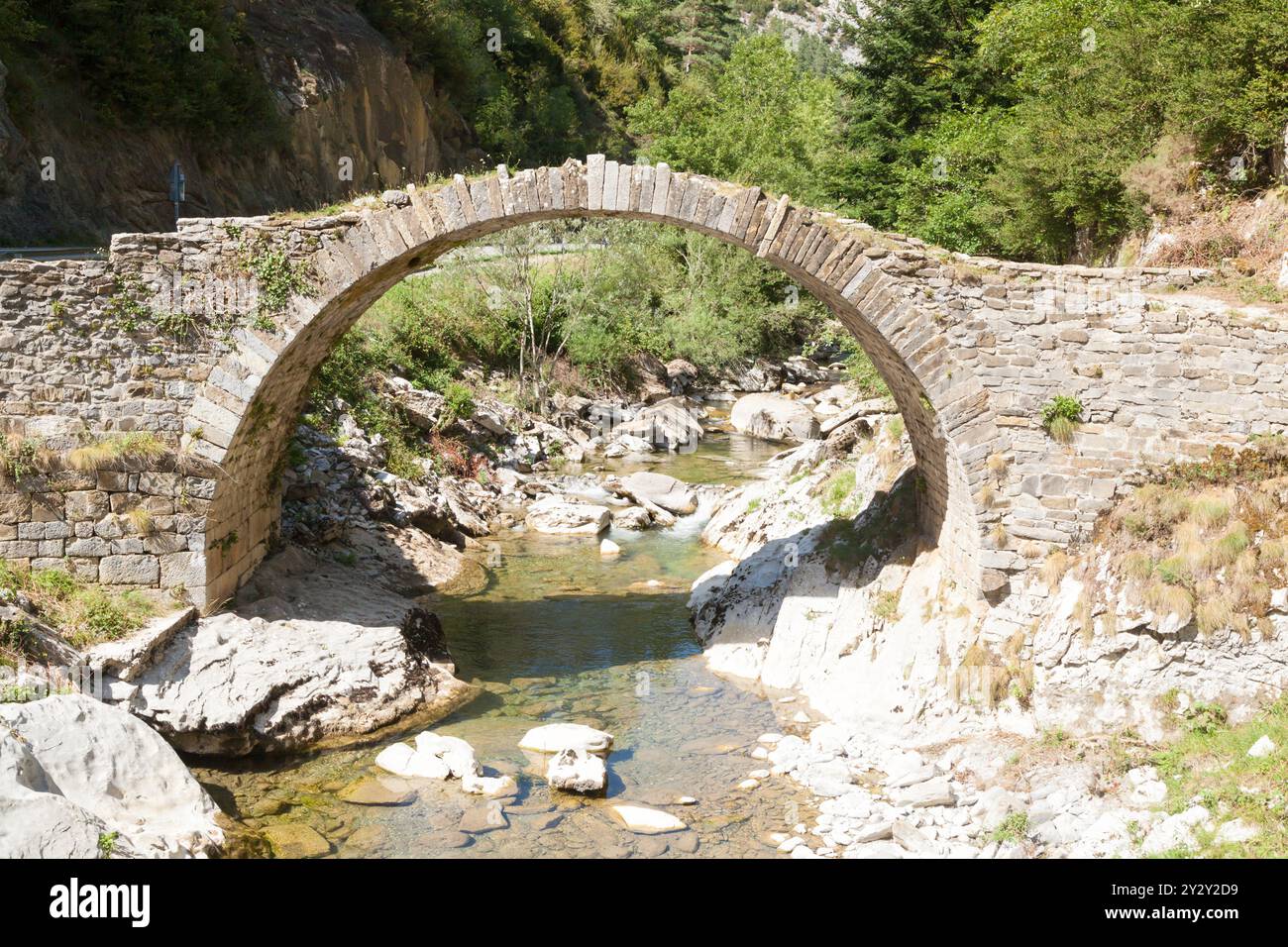Ancient Roman bridge along the road to Anso, Spain. Ordesa valley ...