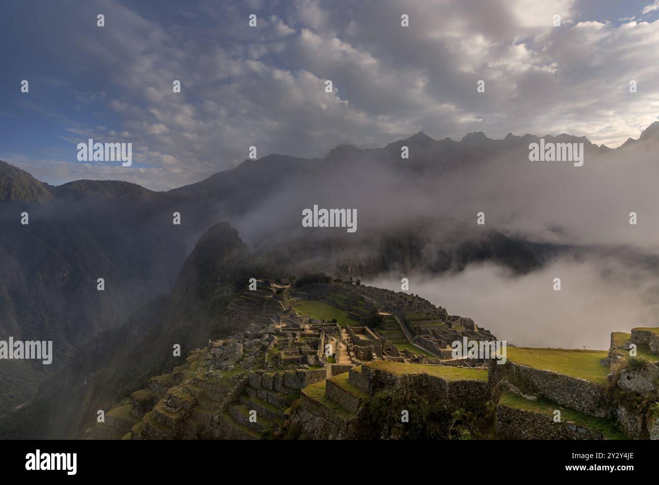 A breathtaking view of Machu Picchu, the ancient Incan city, surrounded ...