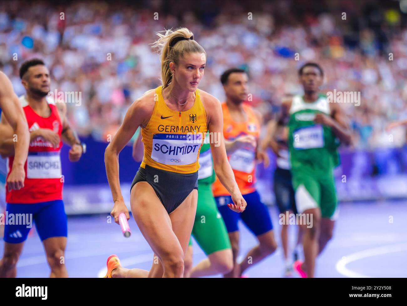 Alica Schmidt participating in the 4X400 meters relay at the Paris 2024 ...