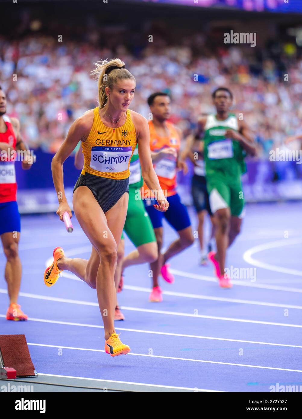 Alica Schmidt participating in the 4X400 meters relay at the Paris 2024 ...