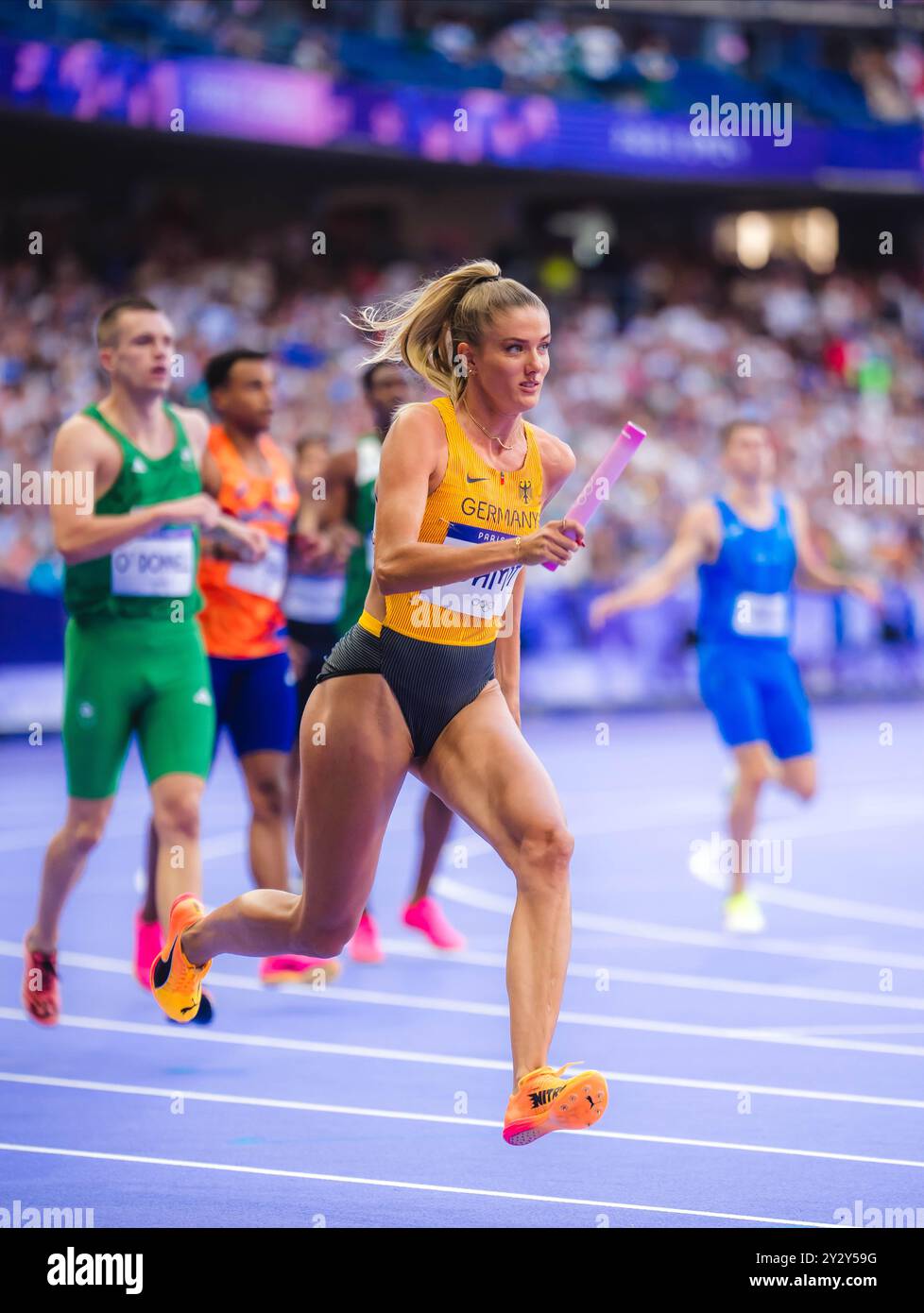 Alica Schmidt participating in the 4X400 meters relay at the Paris 2024 ...