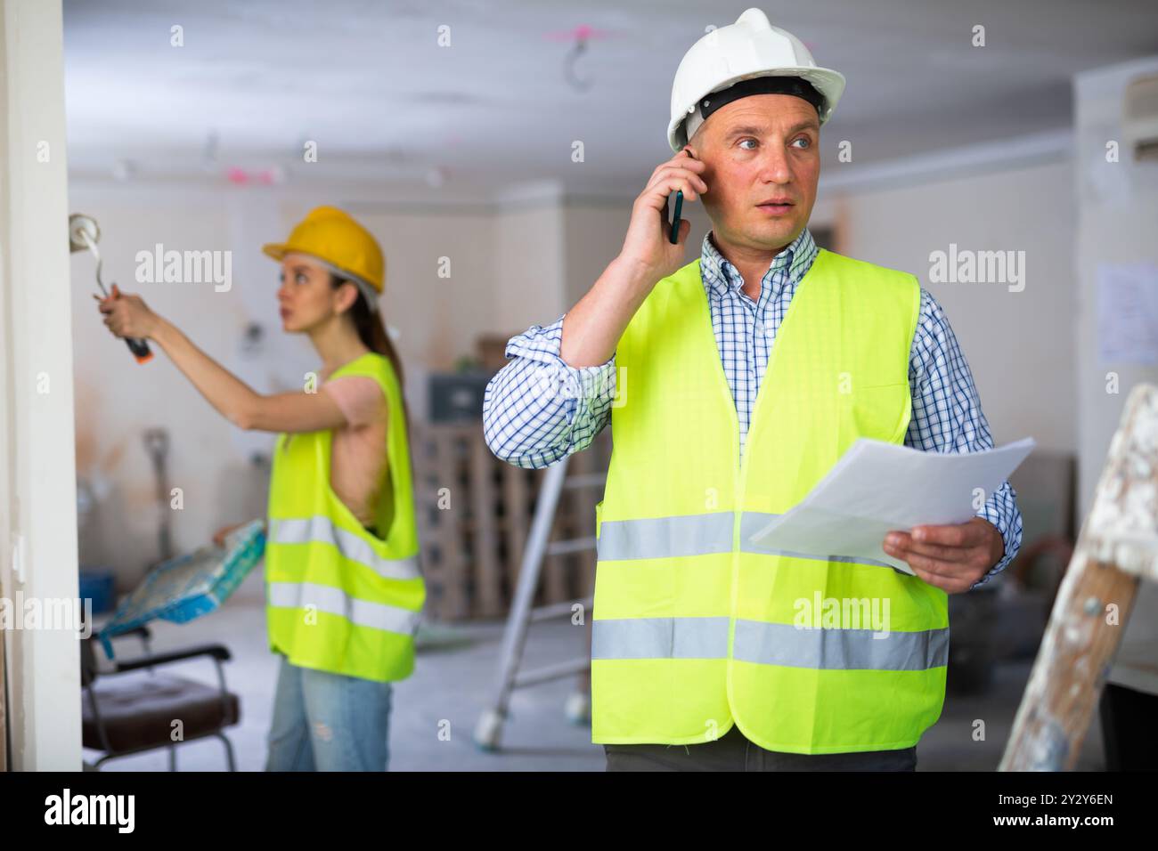 Construction handyman works on apartment hi-res stock photography and ...