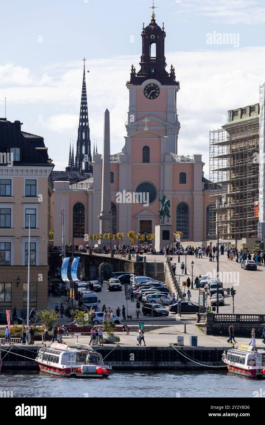 A scenic view of a city square with a prominent church featuring a ...