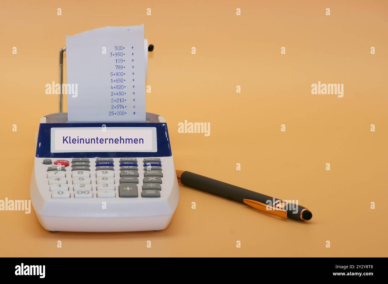The Calculating machine isolated on a neutral background Stock Photo ...