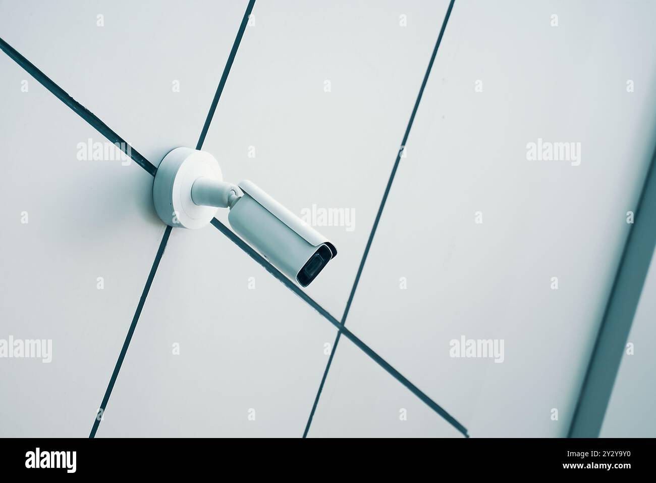 A Modern Security Camera Installed on a Sleek and Minimalist Wall for ...