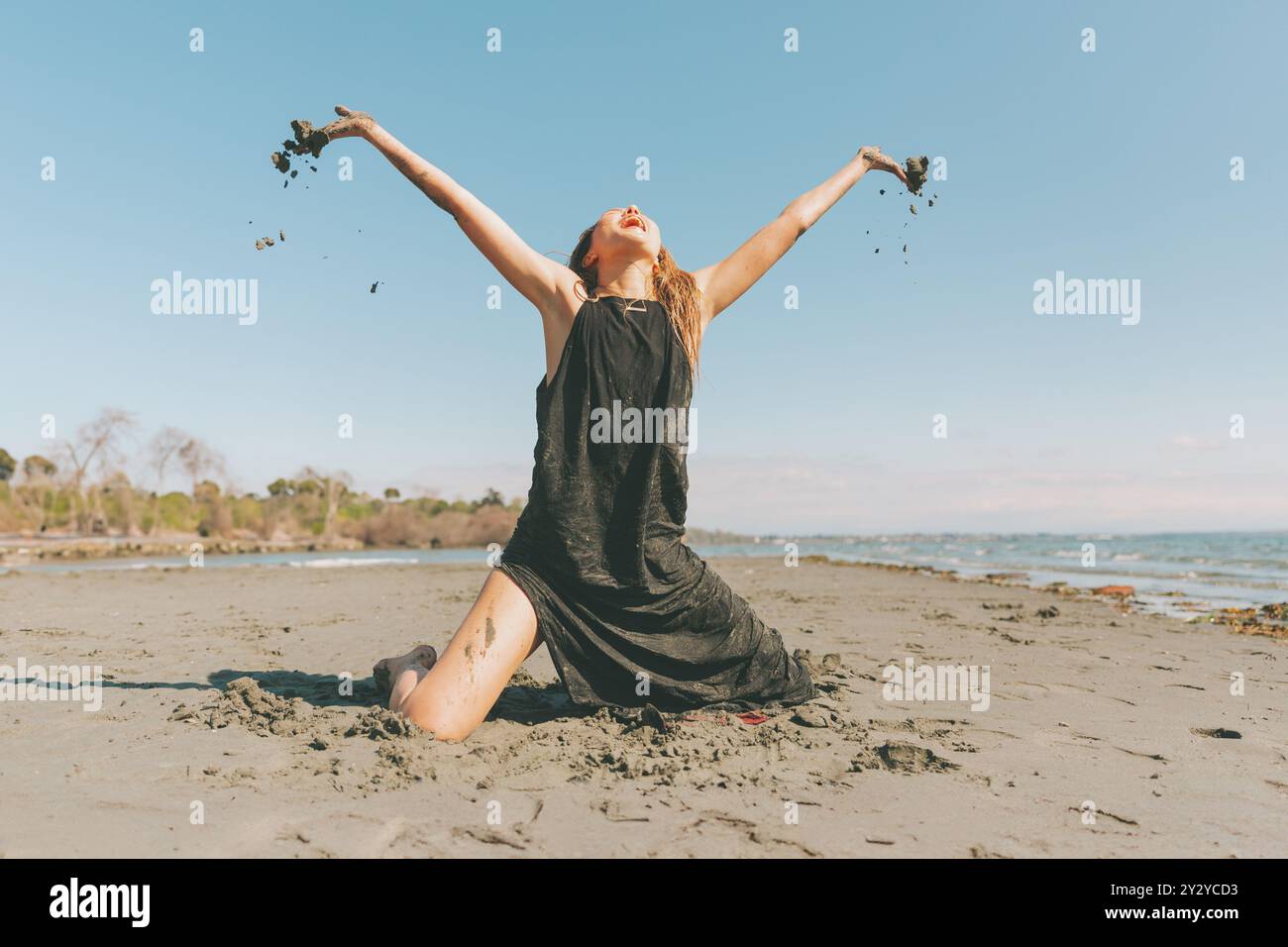 An embodied woman lying in the sand Stock Photo - Alamy