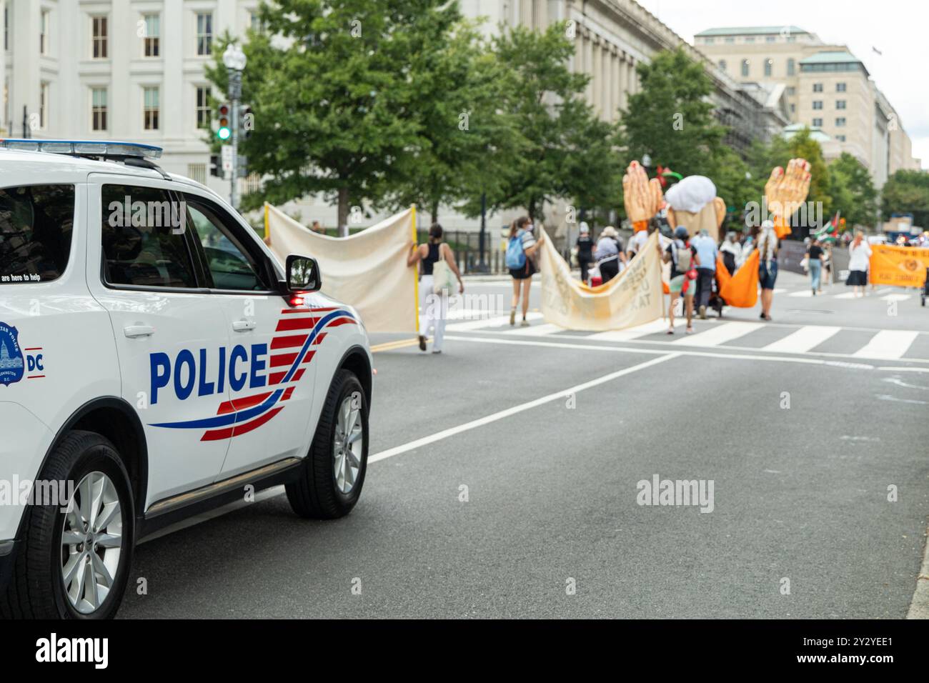 Washington DC, USA - 08/19/2024: A police car is parked on the side of ...