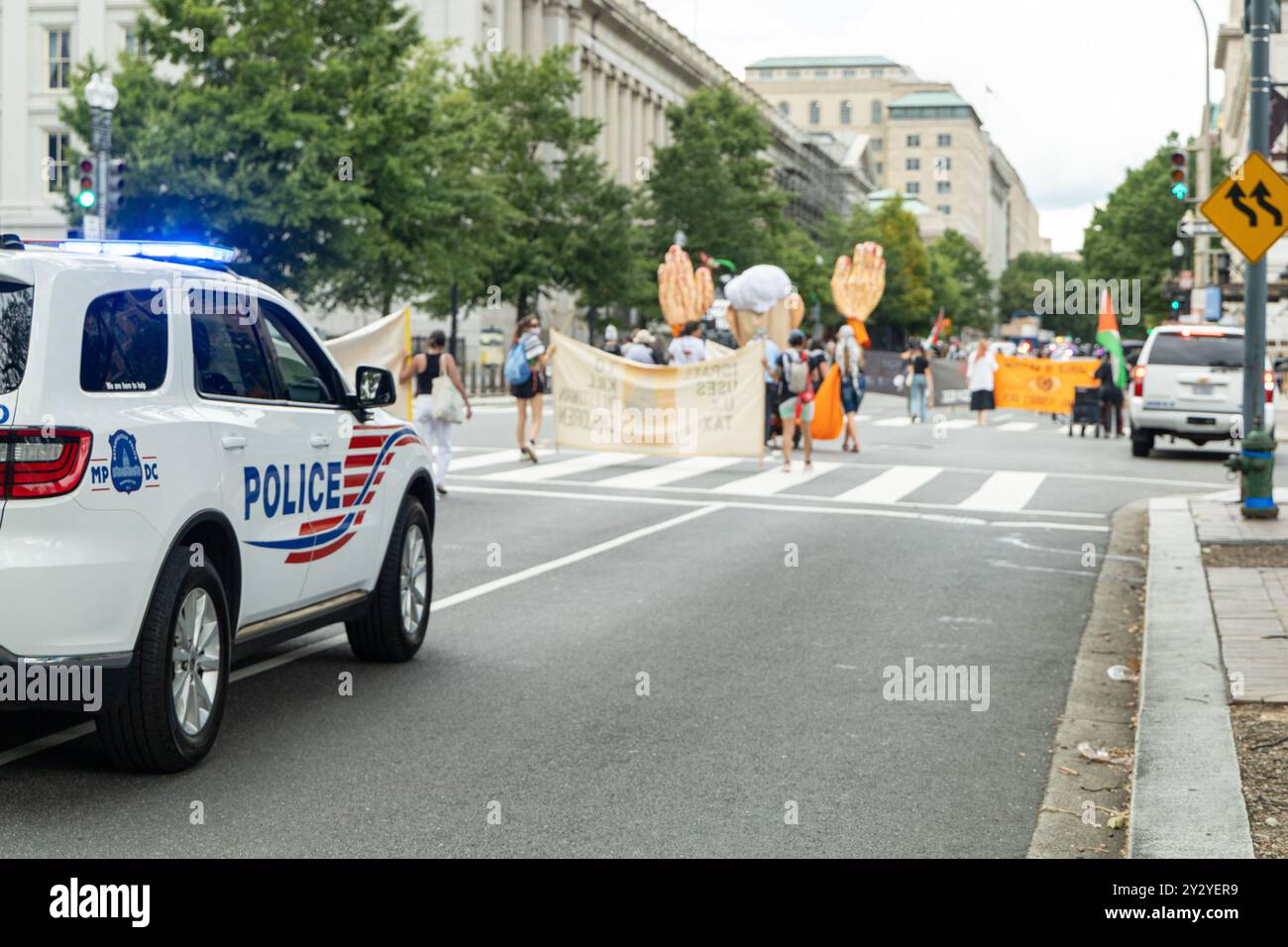 Washington DC, USA - 08/19/2024: A police car is parked on the side of ...